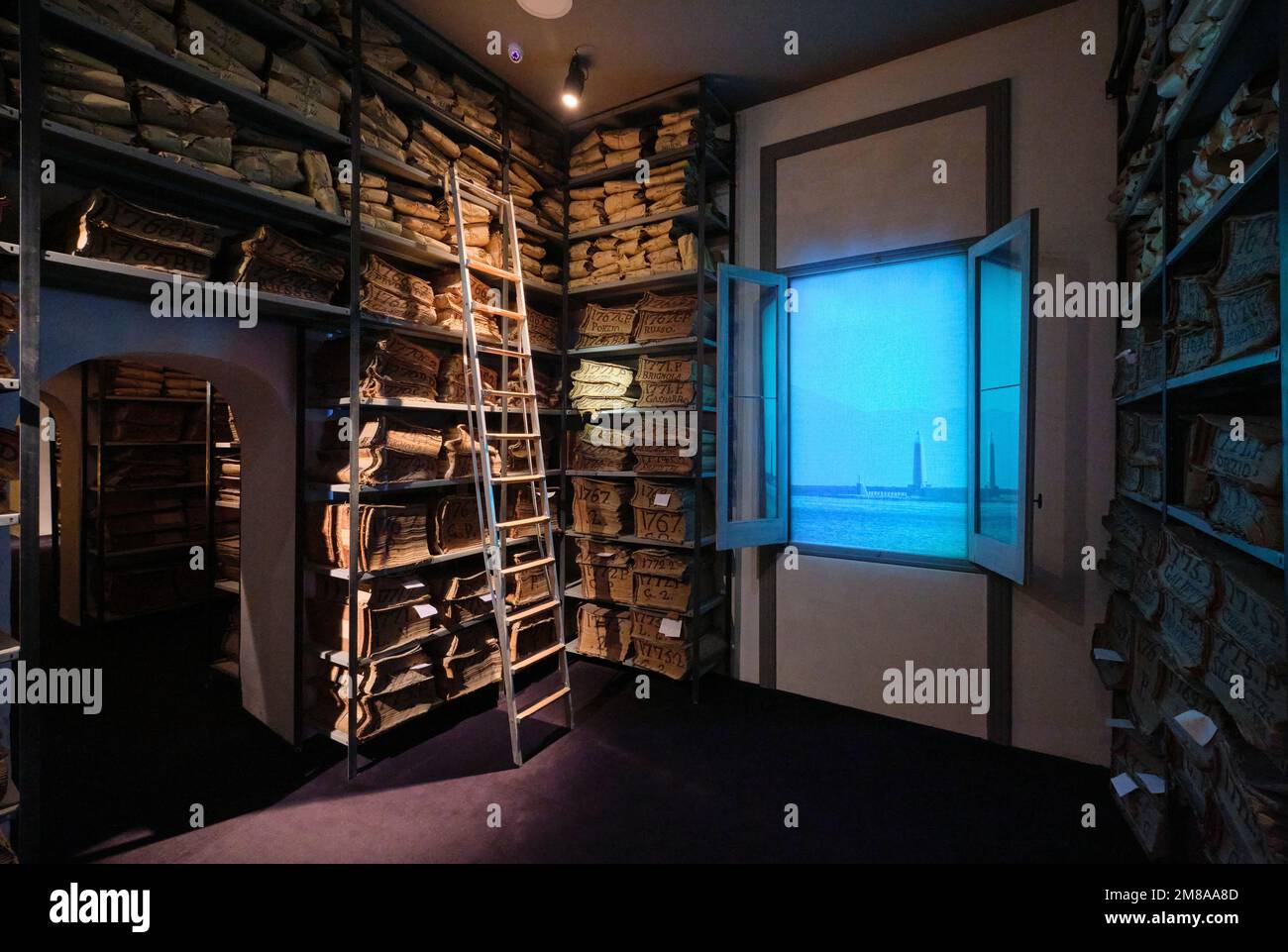 Interior gallery, displaying stacks of old bank ledger, yellowed, sepia ...