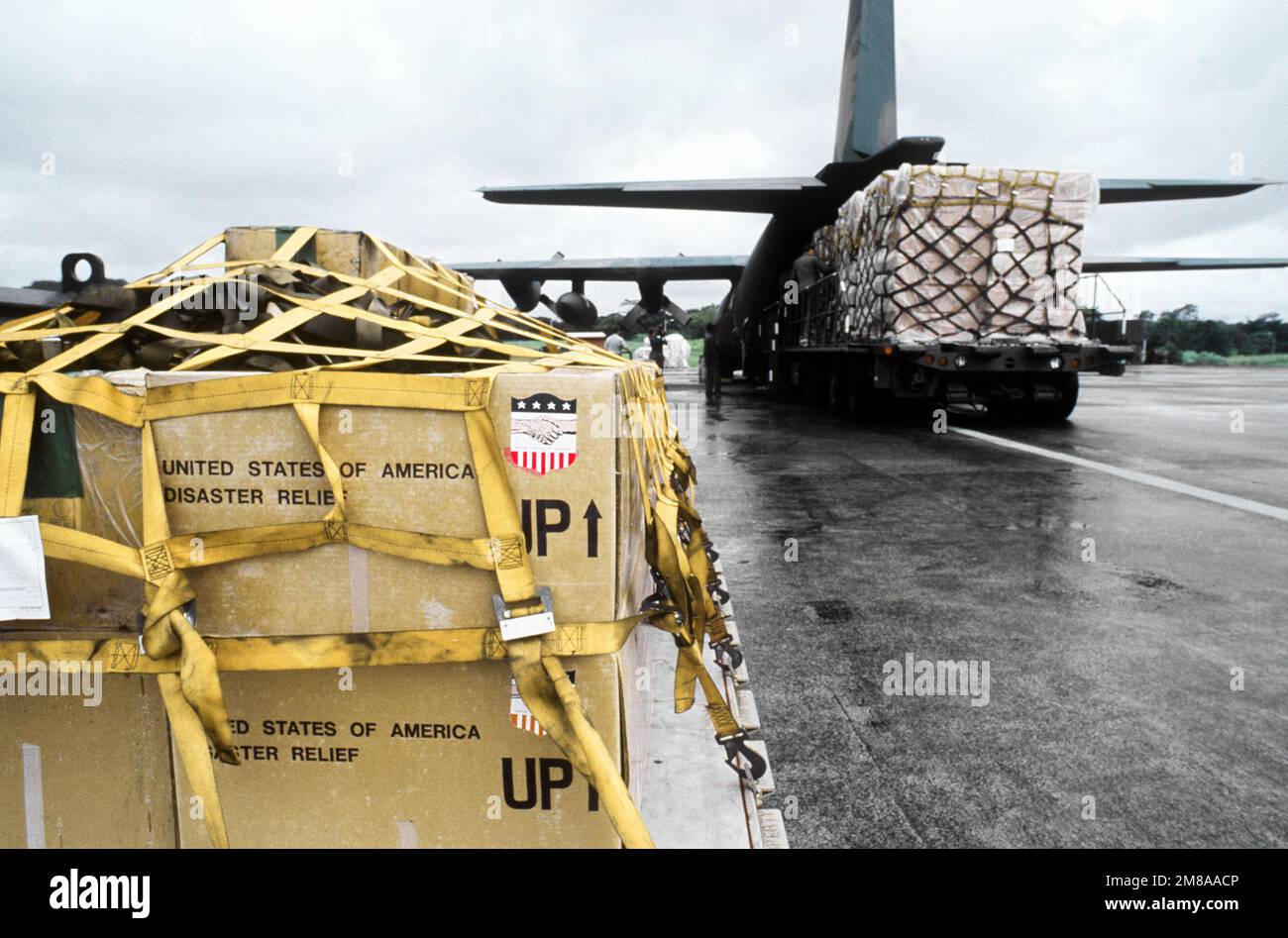 American disaster relief supplies such as chain saws, plastic sheets ...