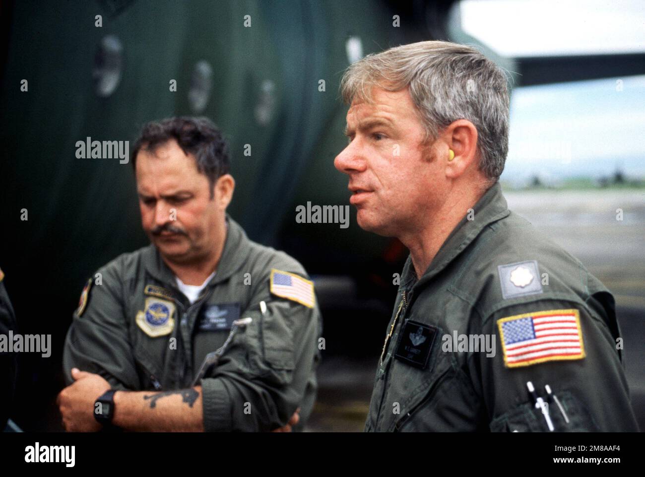 Major W.E. Garrett briefs his crew before departure for Cebu. The West ...