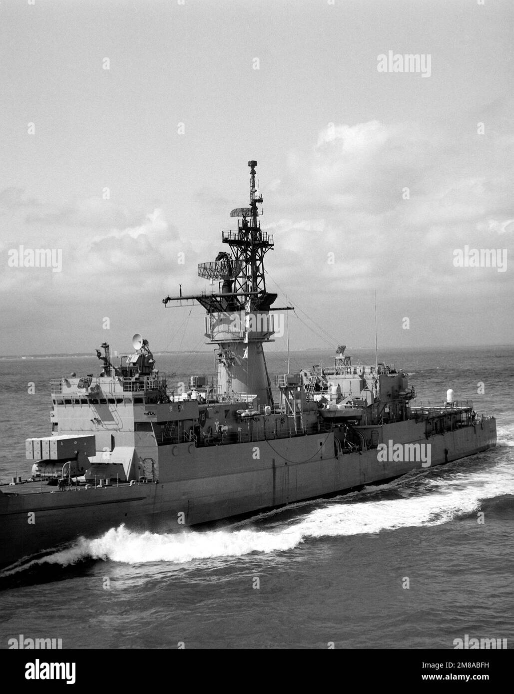 A partial port bow view of the frigate USS BOWEN (FF-1079) underway ...