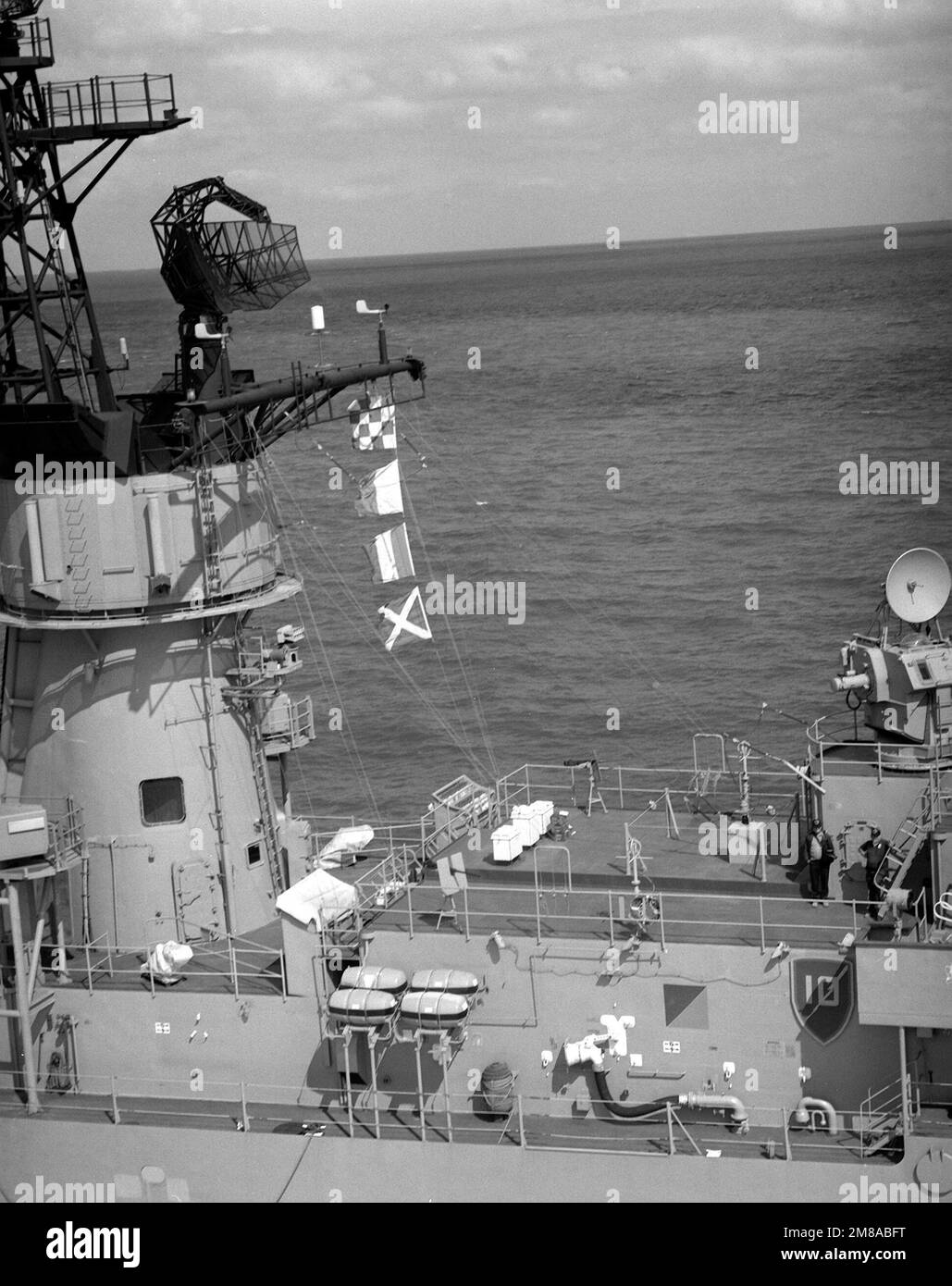 A view of the SPS-40 air search radar, upper left, and the Mark 68 ...