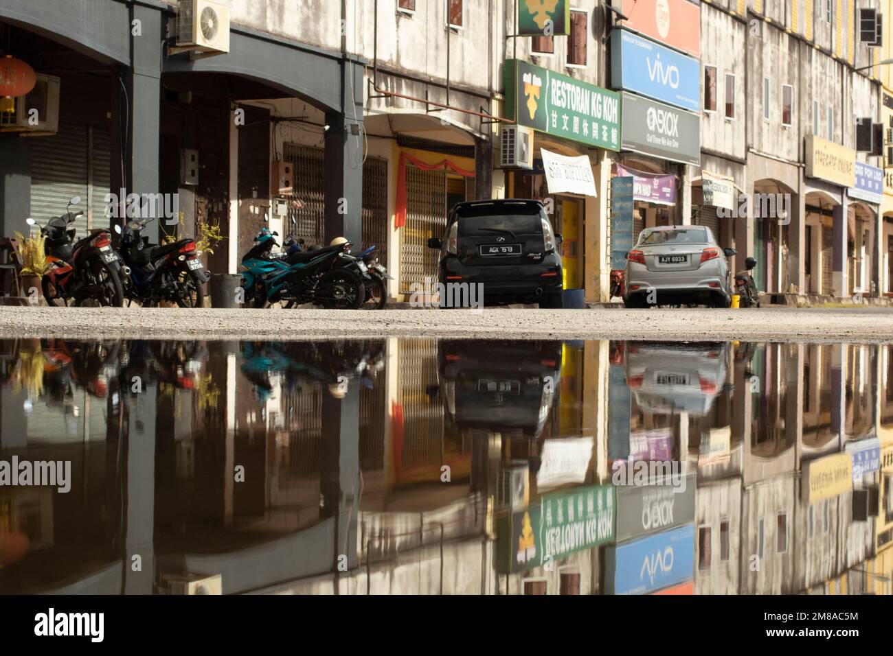 Scene of the stagnant pool of water after rain around the suburb ...