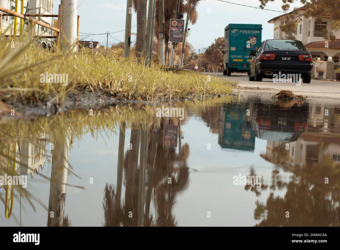 Scene of the stagnant pool of water after rain around the suburb ...
