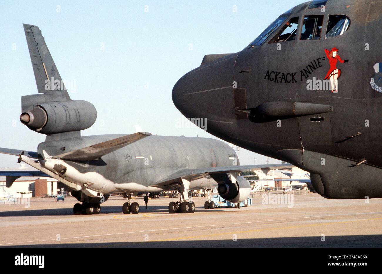 A 62nd Bombardment Squadron B-52 Stratofortress aircraft, foreground ...
