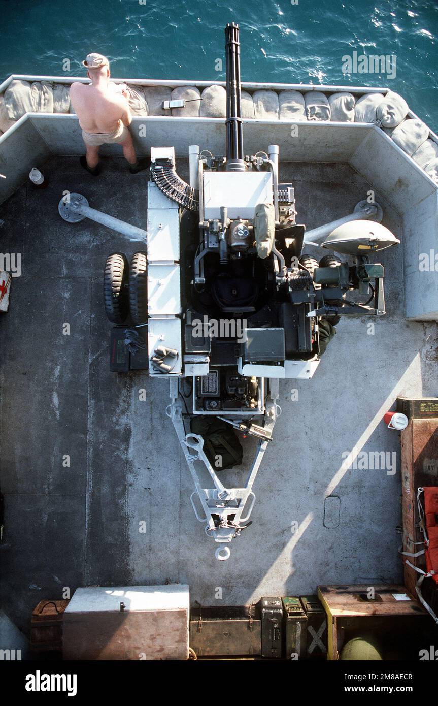 An overhead view of an M-167 Vulcan 20mm anti-aircraft gun aboard the ...