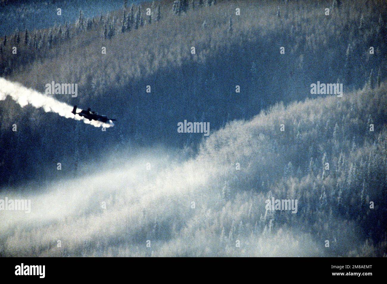 An A-10 Thunderbolt aircraft executes a strafing run on the Yukon Range ...