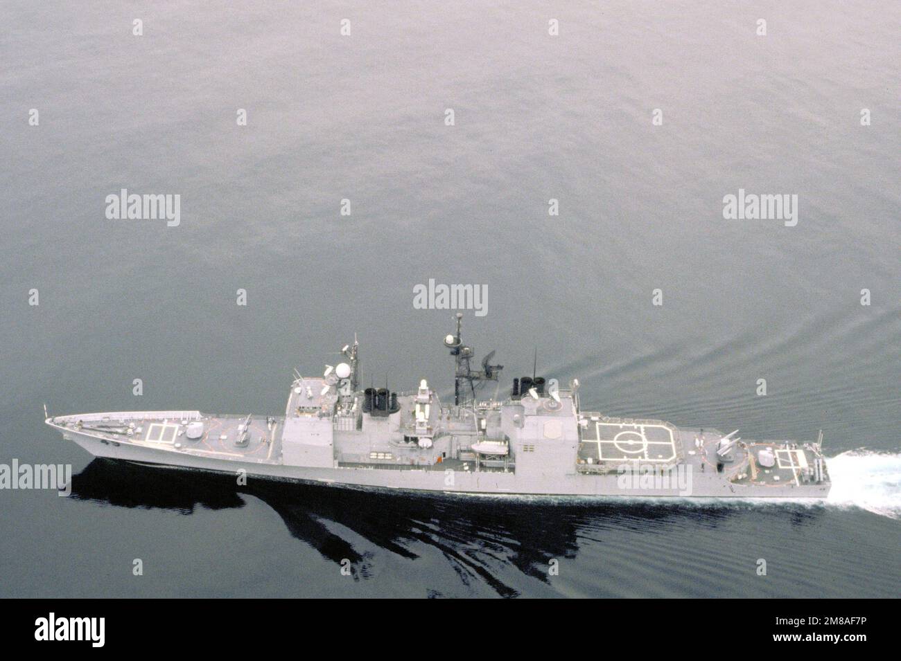 An elevated port beam view of the guided missile cruiser USS VINCENNES ...