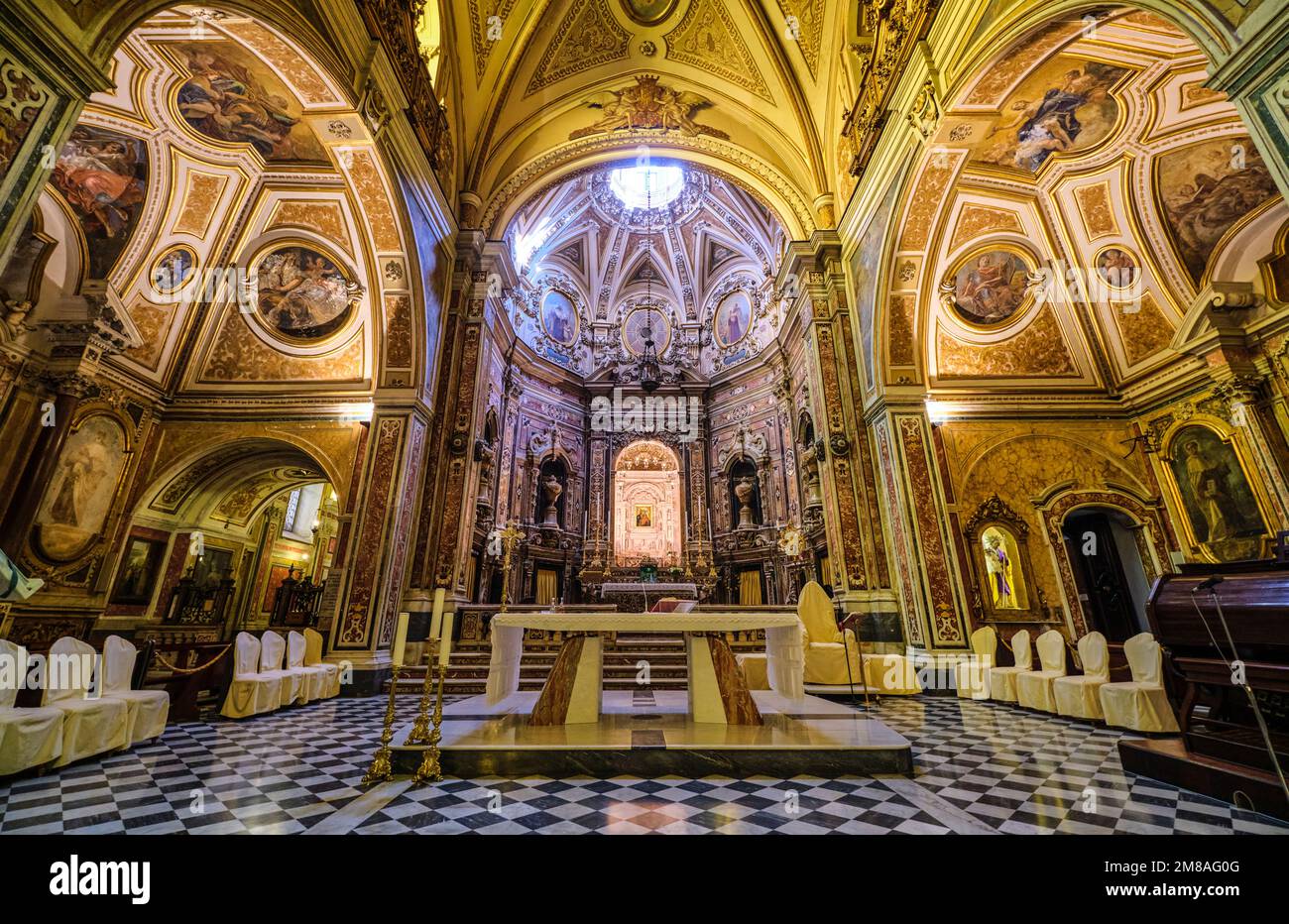 A view of the main altar with oculus dome at the Baroque Catholic ...