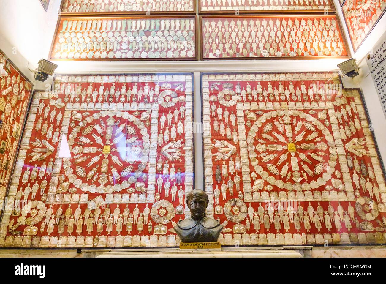 A huge collection of silver, tin votive medallions at the Baroque ...