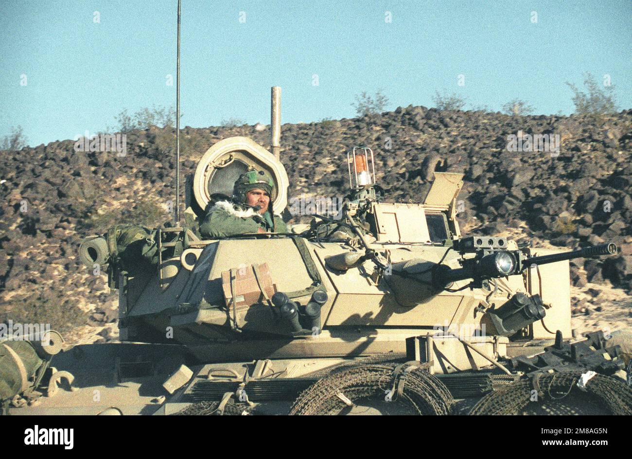 A soldier of the 24th Infantry Division (Mechanized) stands in the open ...