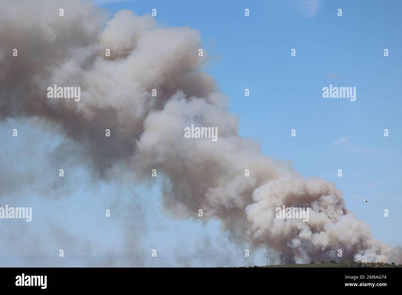 A closeup of a huge grey heavy smoke caused by the Eruption Stock Photo ...