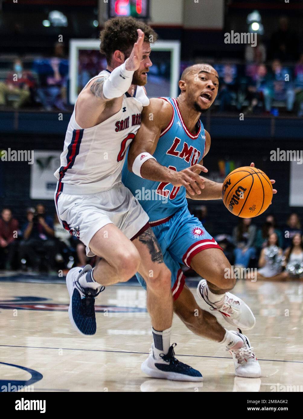 January 12 2023 Moraga CA, U.S.A. Loyola Marymount guard Cam Shelton (20)goes to the hoop during ...