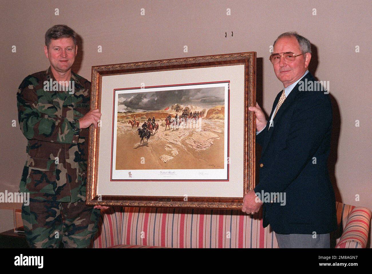 Congressman Joe Prather of Kentucky presents a framed print to MGEN ...