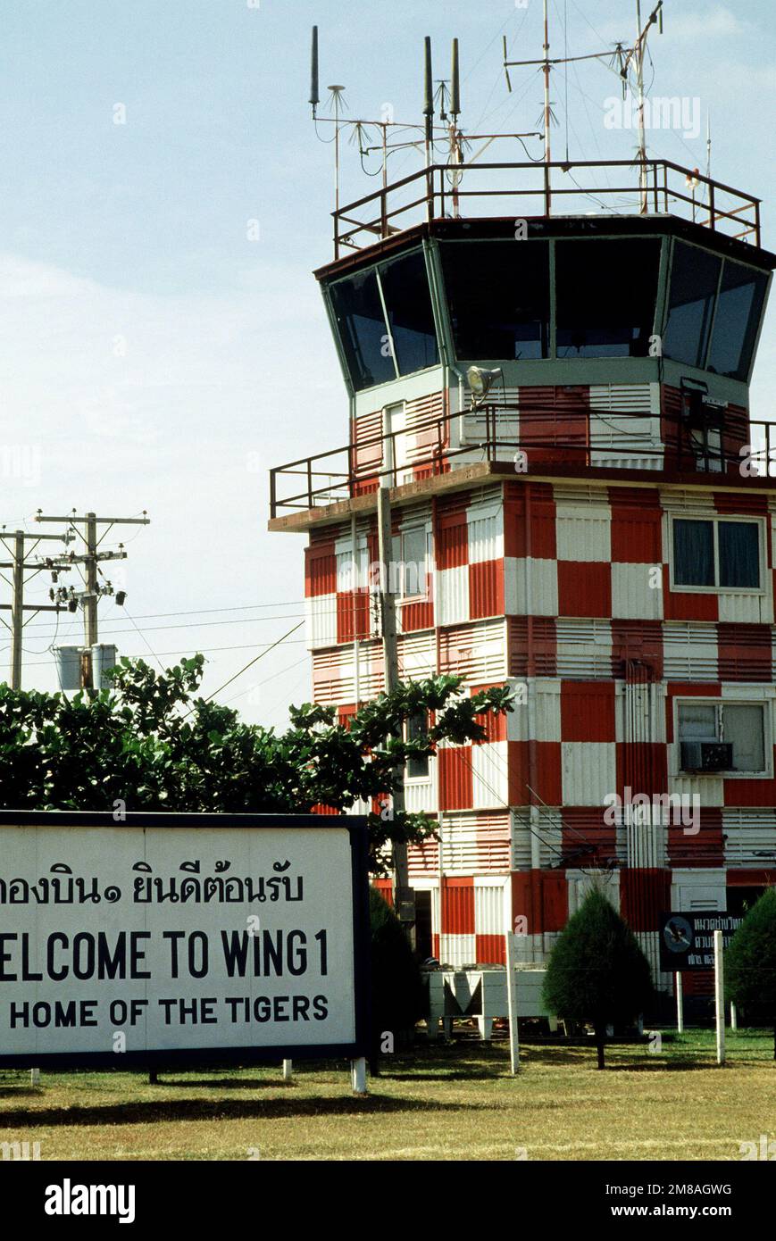 A welcome sign is posted beside the main control tower at Korat Royal ...