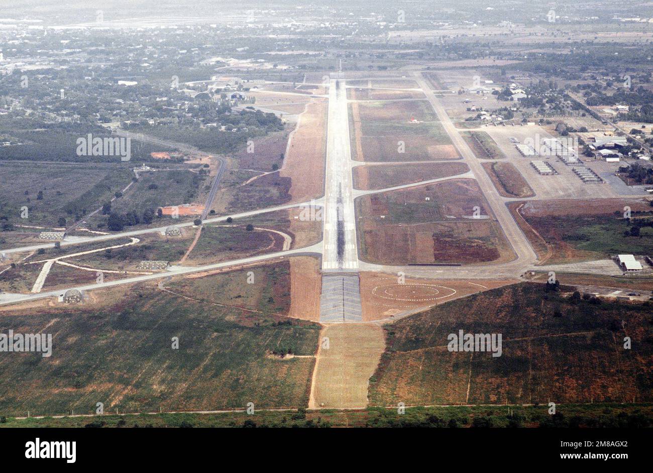 An aerial view of the approach end of the primary runway at Korat Royal ...