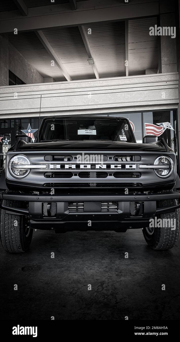 A grayscale front view of a New Ford Bronco Black four door car ...