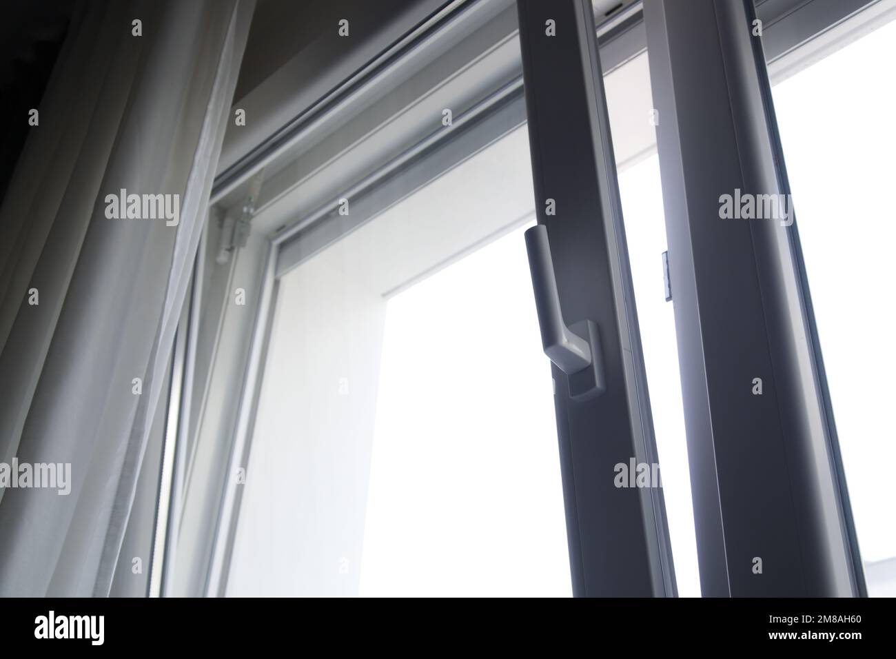 Tilt and turn pvc window leaned in at the top to allow controlled ...