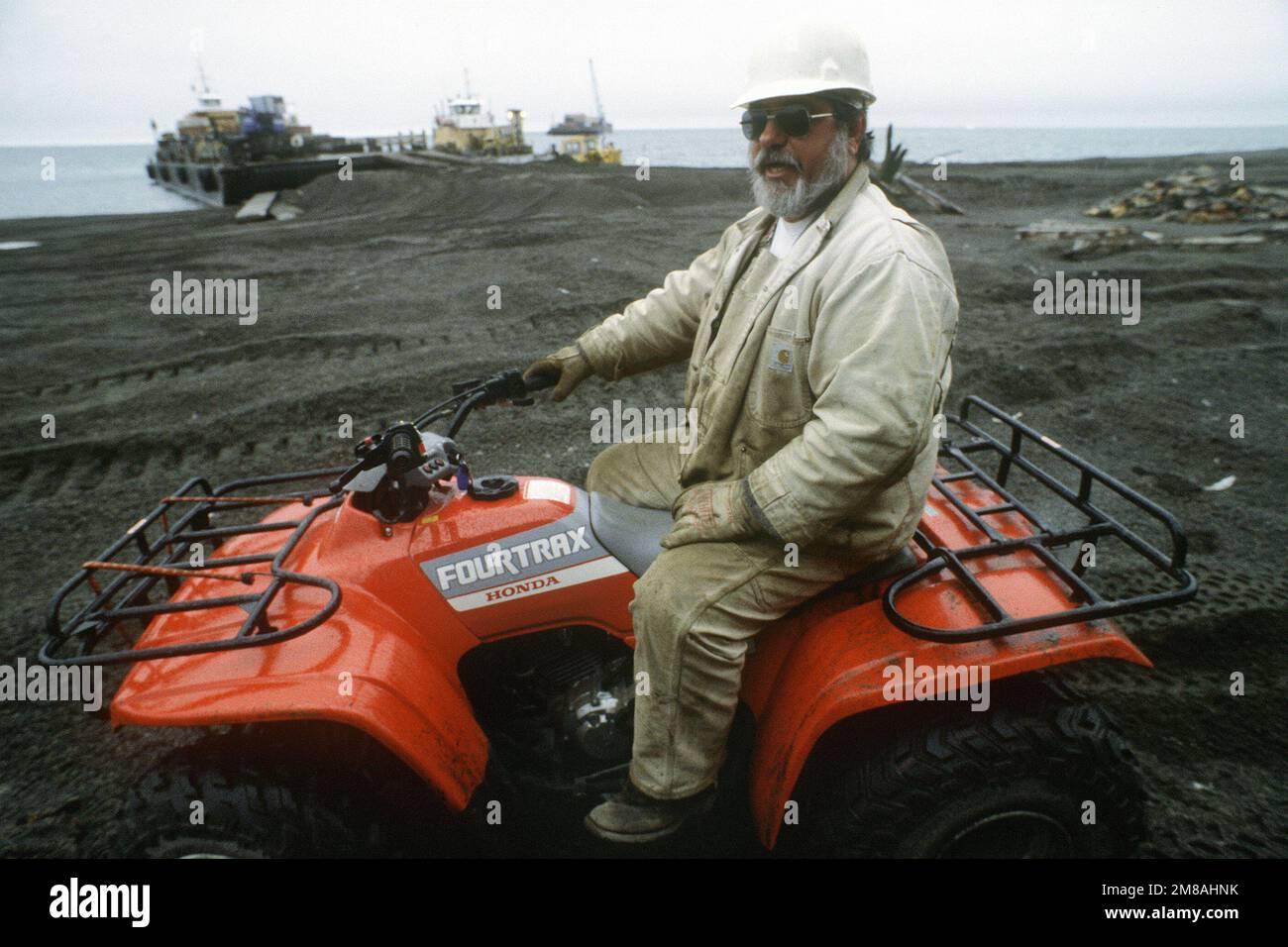 Ray Brown, an employee of APUTCO, sits on an all-terrain vehicle as he ...