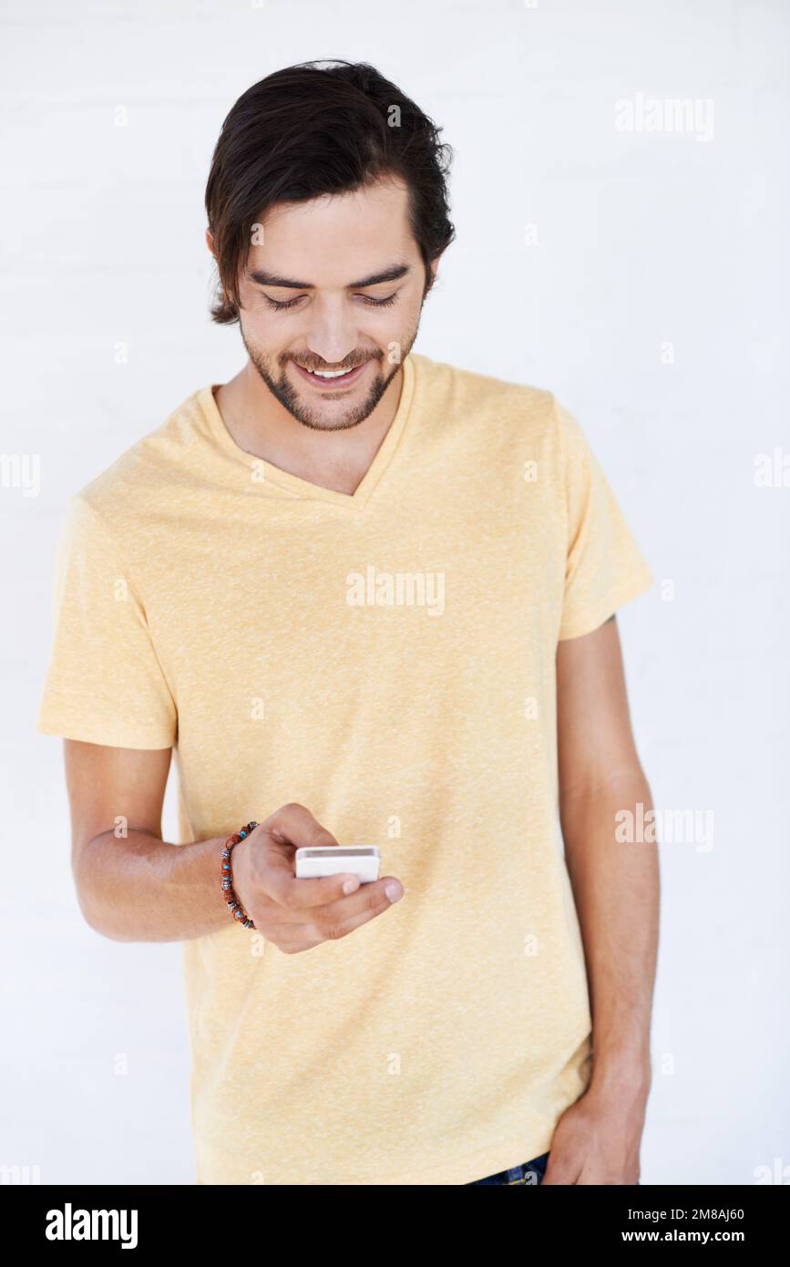 Phone, communication and man on technology typing a cellphone text with ...