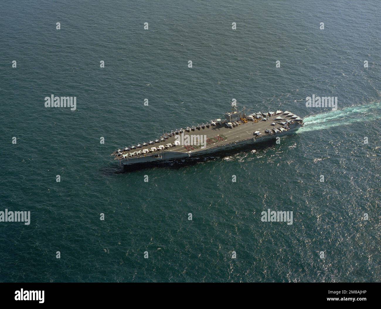 Crew members form the phrase "Ho, Ho, Ho" and a Christmas tree on the ...