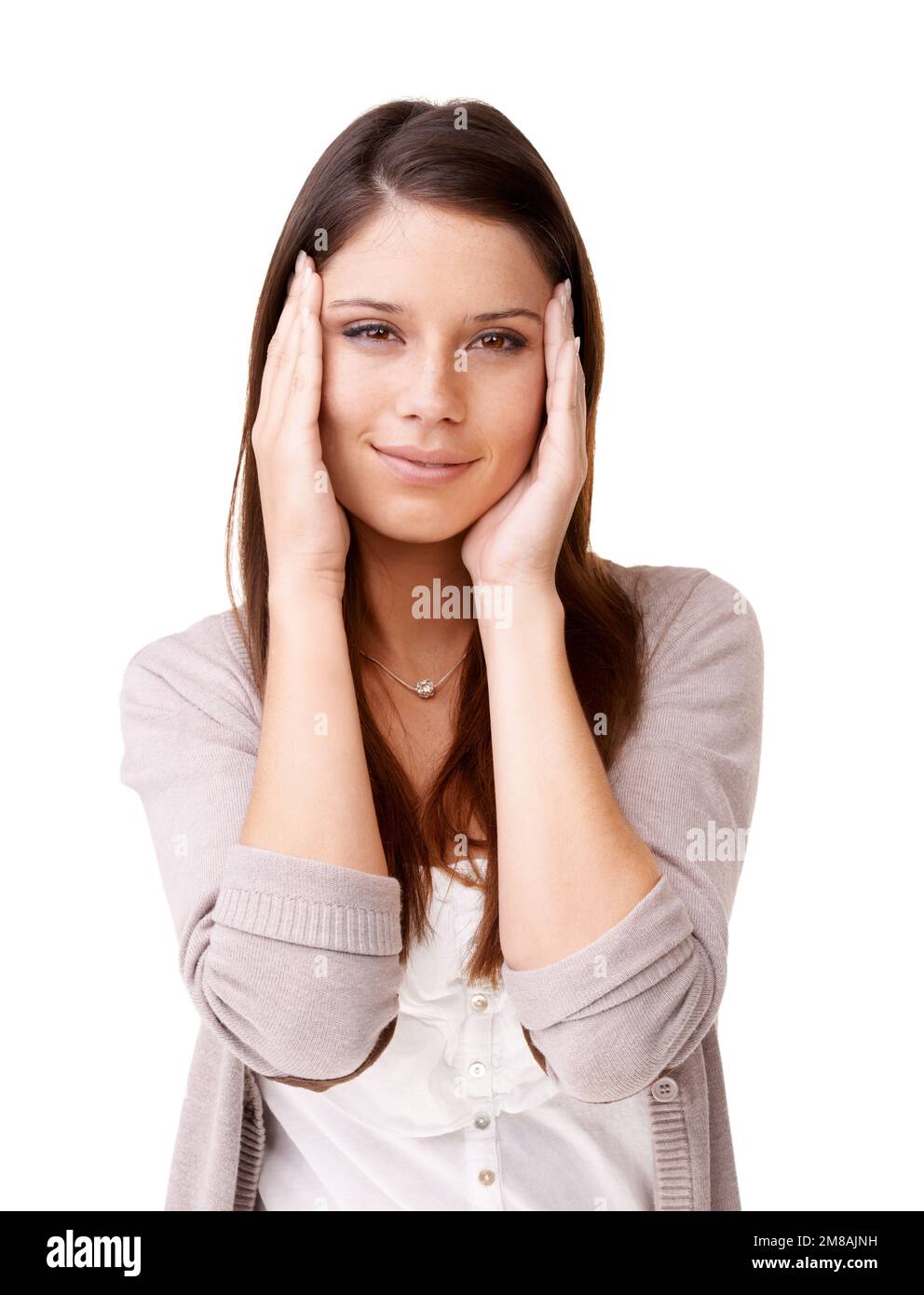 Feeling relaxed. Smiling young woman with her hands on either side of ...