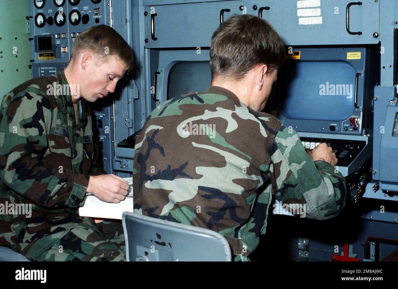 Two students at the US Army Signal School practice troubleshooting ...