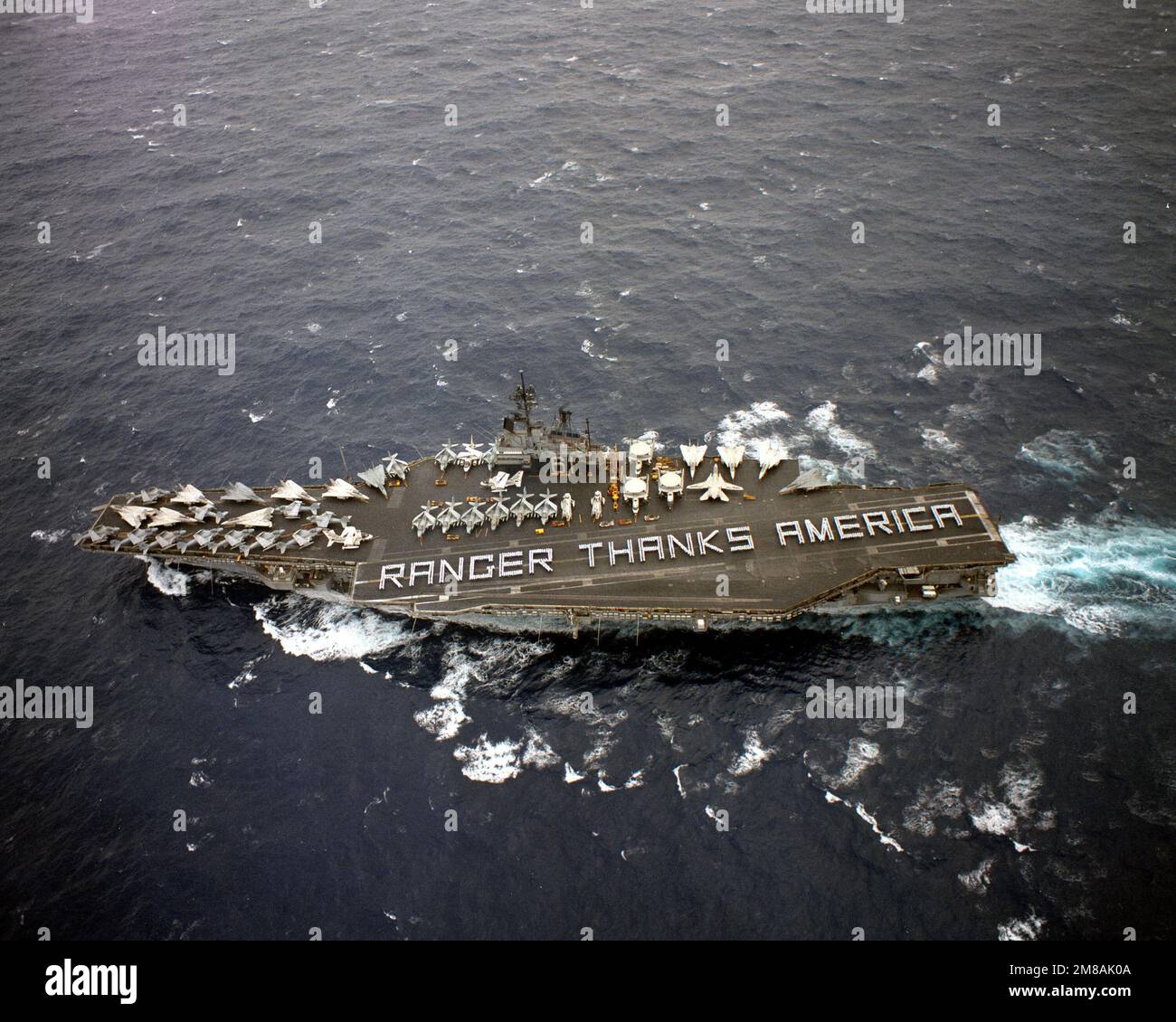 Crew members spell out "Ranger Thanks America" on the flight deck of ...