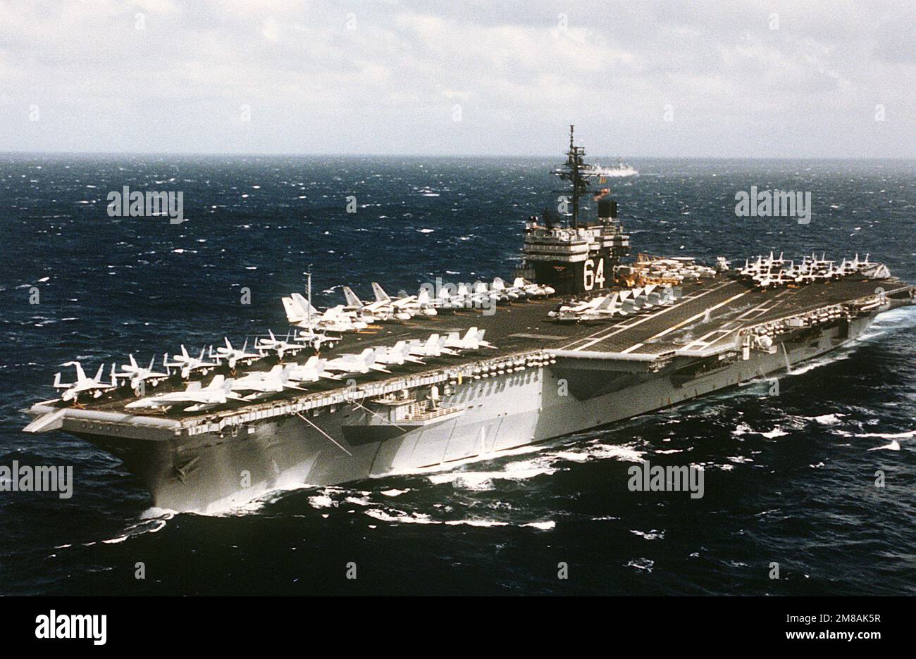 A port bow view of the aircraft carrier USS CONSTELLATION (CV-64 ...