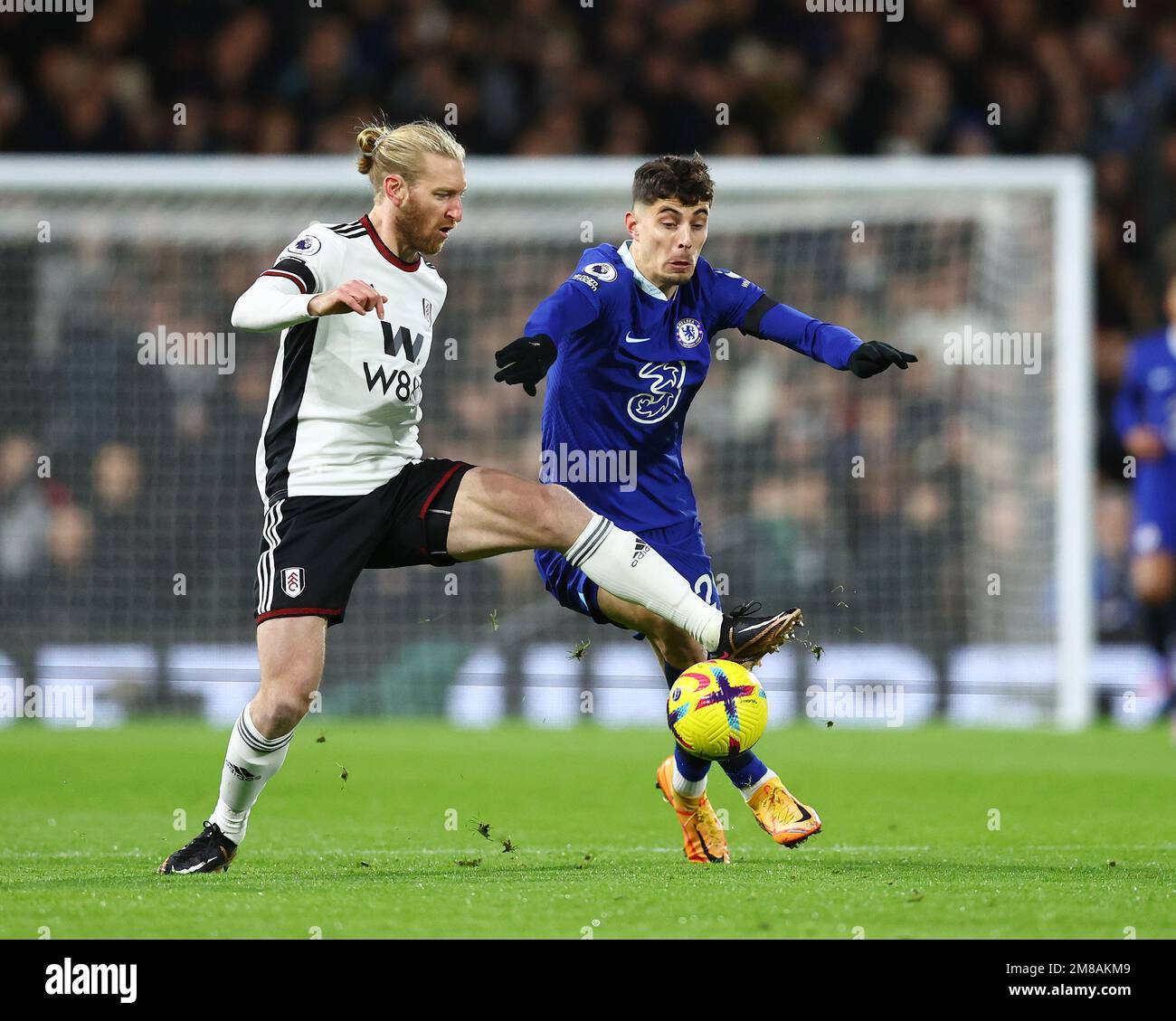 London, England, 12th January 2023. Tim Ream of Fulham with Kai Havertz ...
