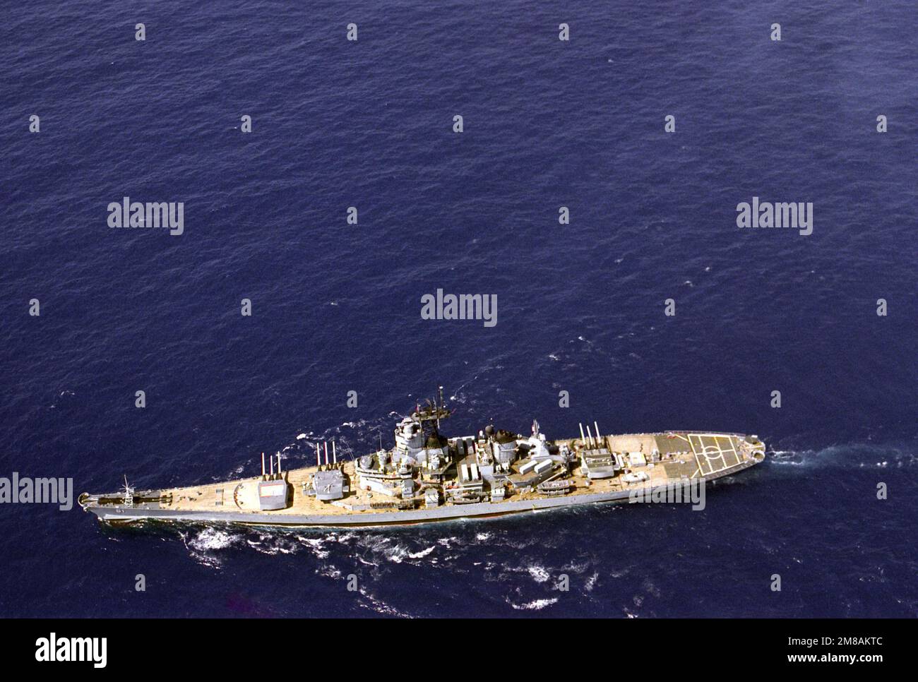 An overhead view of the battleship USS IOWA (BB-61) underway as part of ...