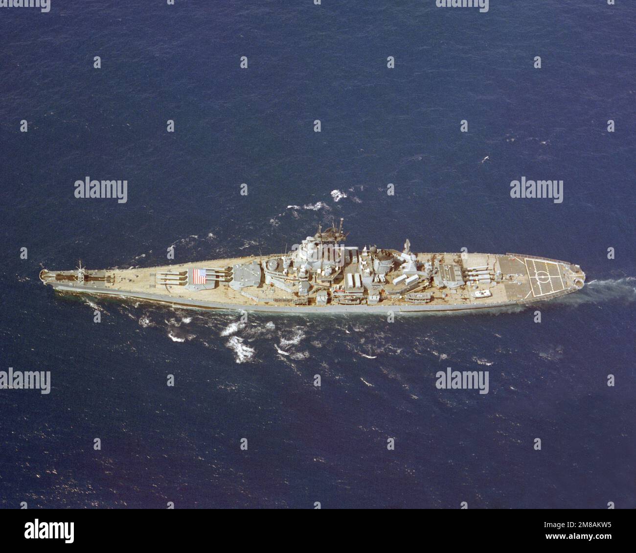 An overhead view of the battleship USS IOWA (BB-61) underway as part of ...
