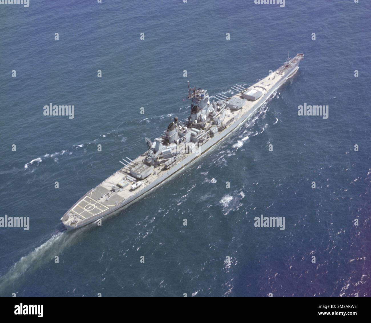 A starboard quarter view of the battleship USS IOWA (BB-61) underway as ...