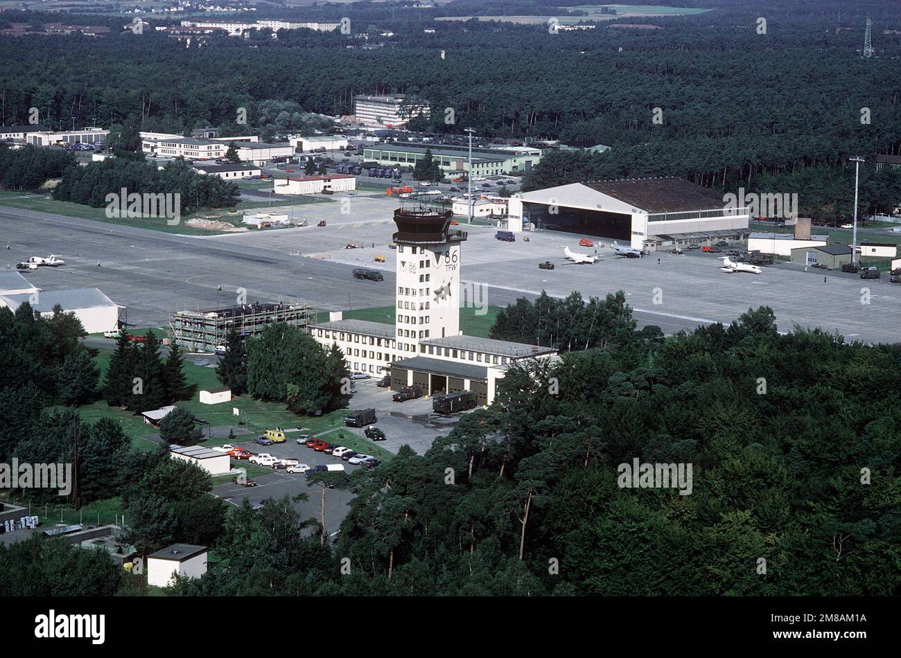 An aerial view of the base control tower and maintenance hangar ...