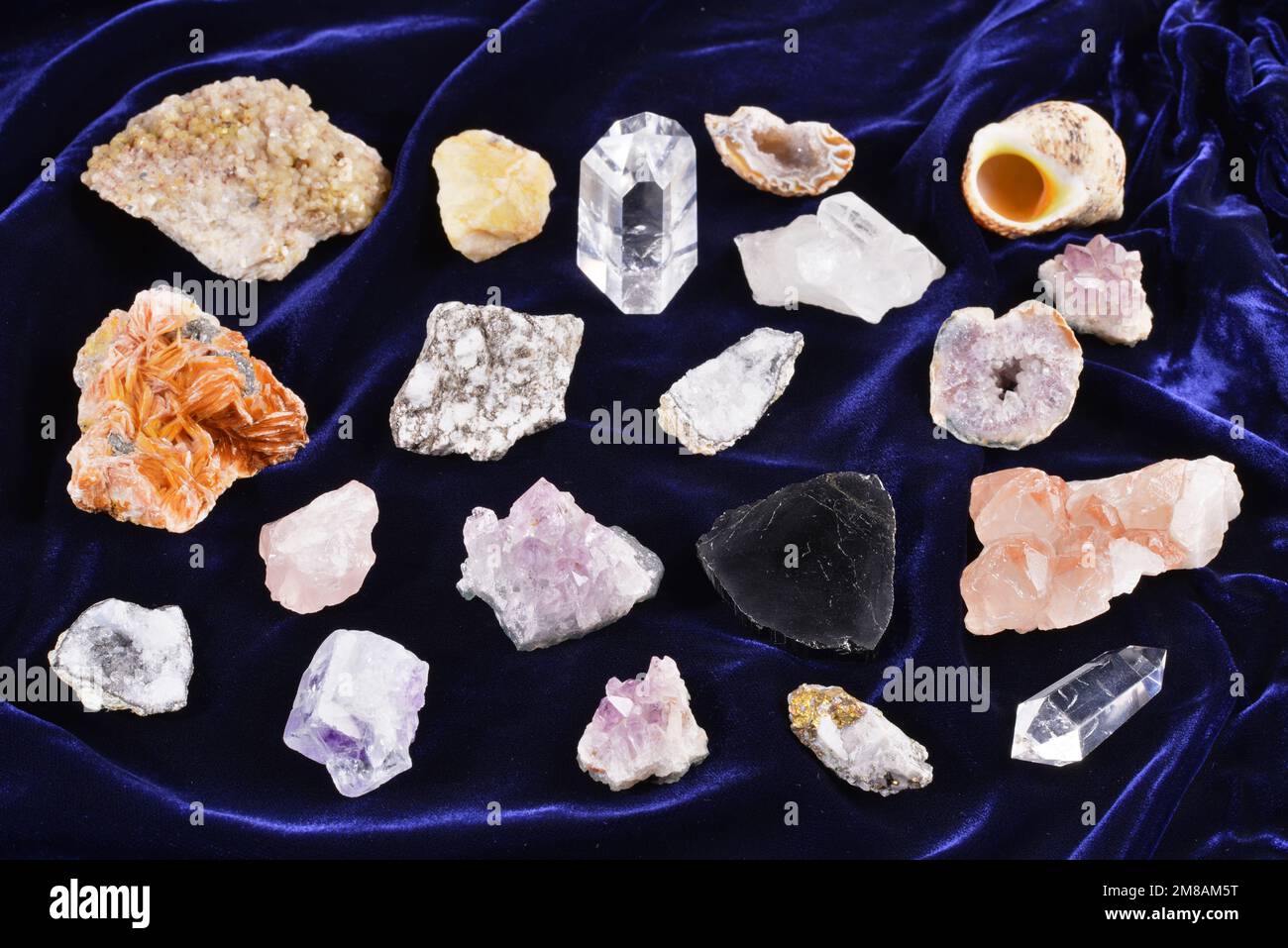 Collection Set of Mineral Stones on blue Satin Background Stock Photo ...