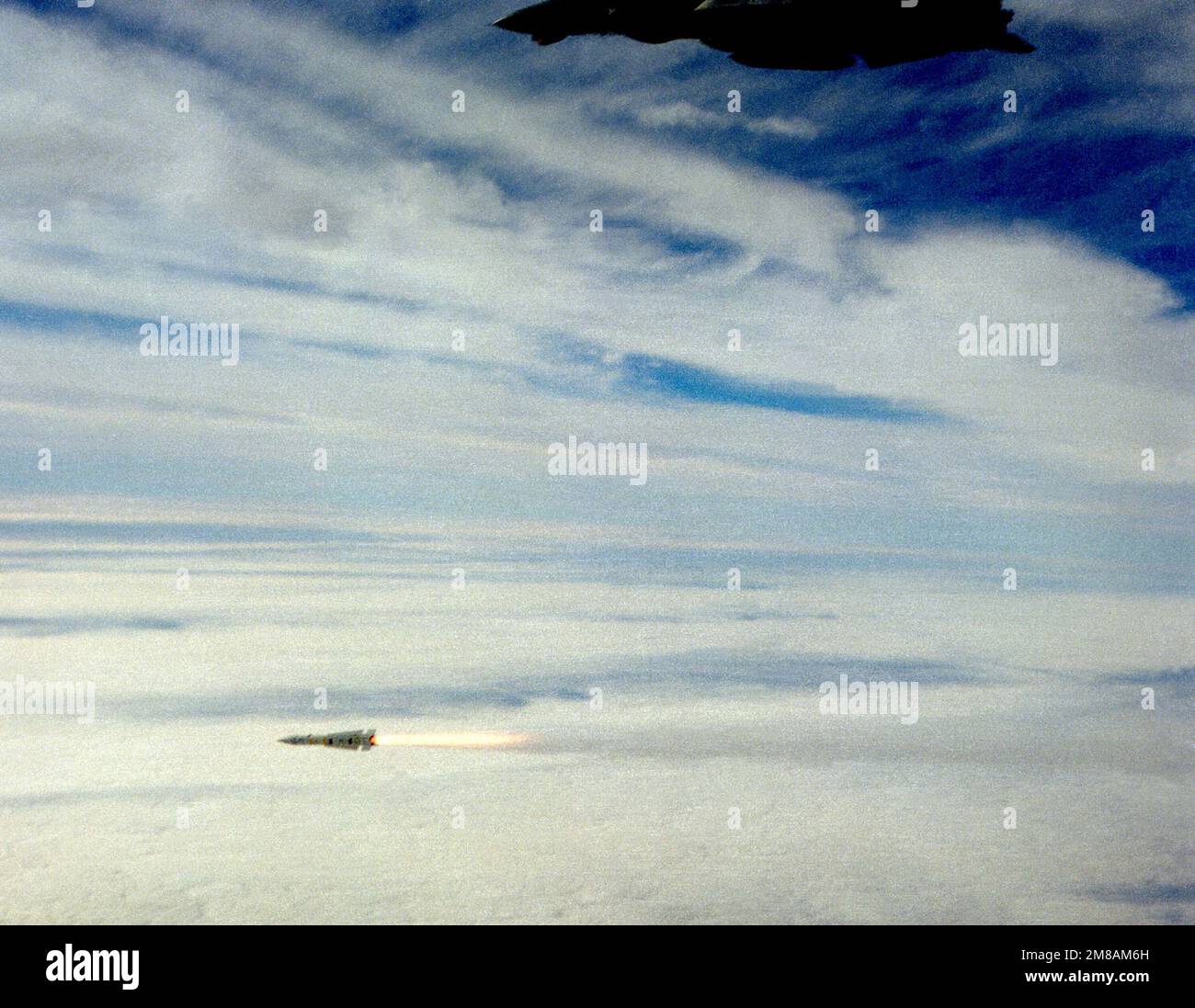 An air-to-air left side view of an AIM-54C Phoenix air-to-air missile ...