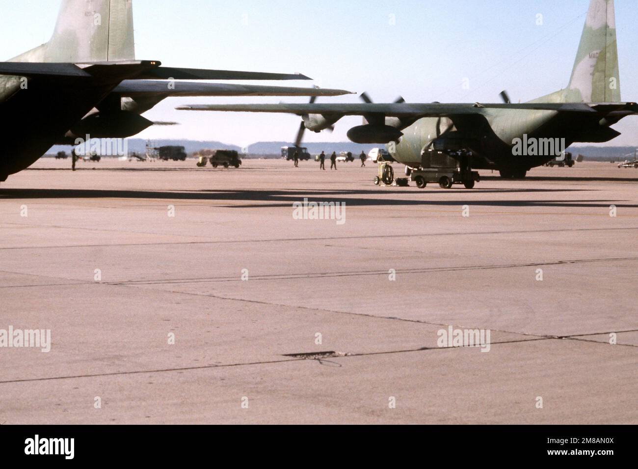 A 463rd Tactical Airlift Wing C-130 Hercules aircraft begins to taxi ...