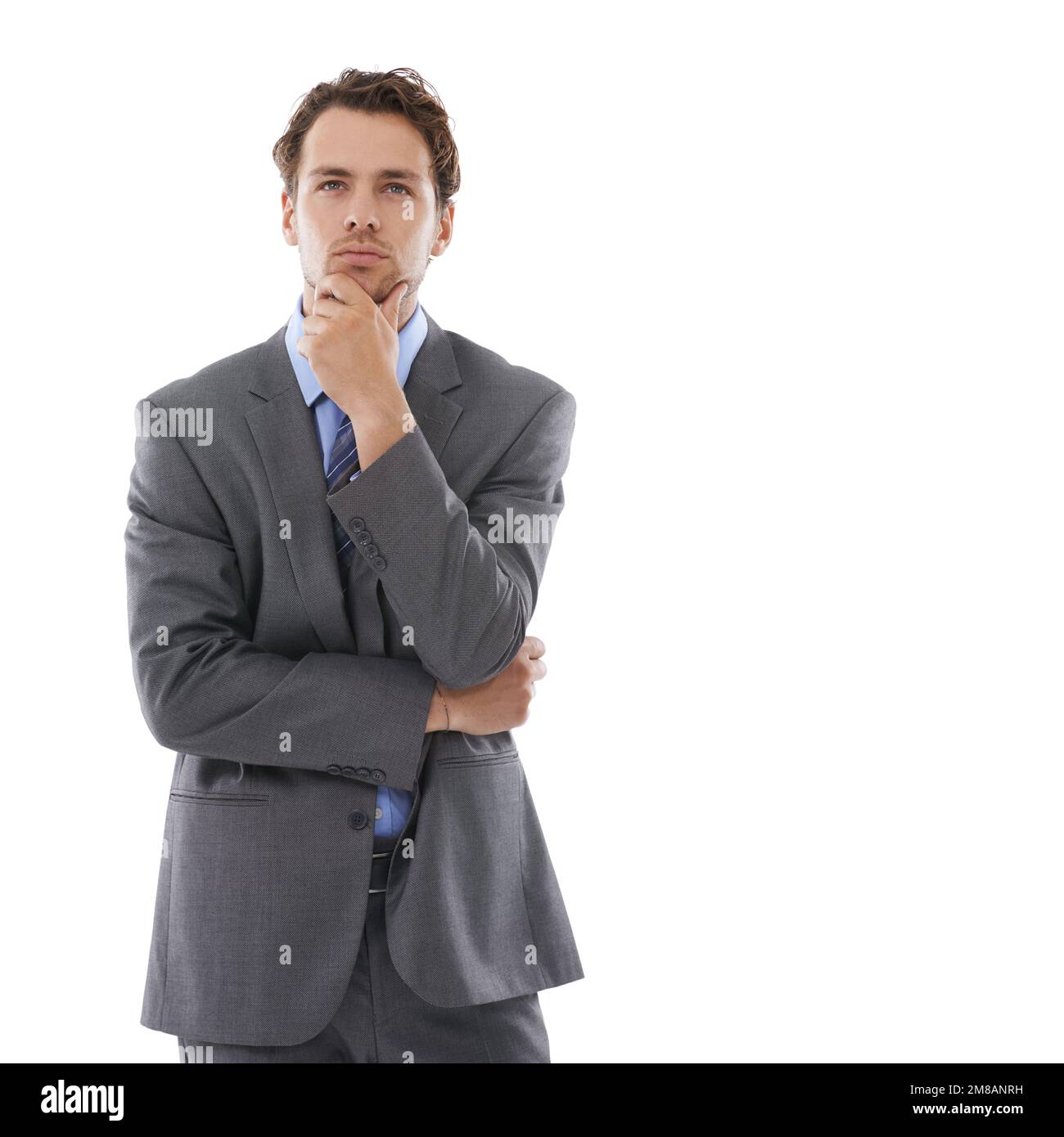 Wondering what the future holds. A pensive businessman against a white ...