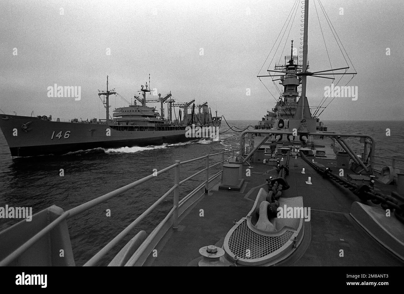 The fleet oiler USNS KAWISHIWI (T-AO-146), left, conducts underway ...
