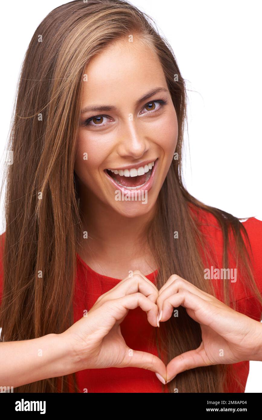 Woman, smile portrait and heart hands shape, emoji for love sign ...