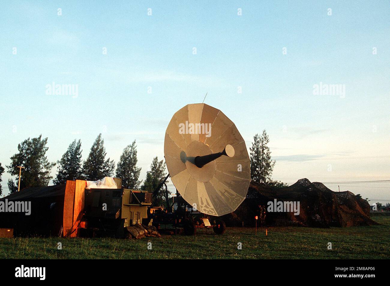 A view of a transportable antenna and other equipment set up by the 4th ...