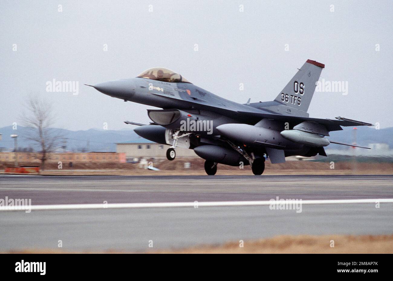 An F-16C Fighting Falcon aircraft of the 36th Tactical Fighter Squadron ...