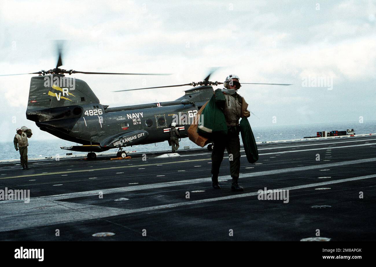 Mail is delivered to the aircraft carrier USS CONSTELLATION (CV 64) by ...
