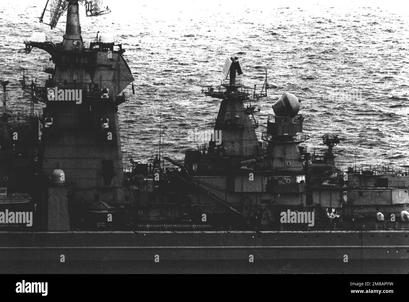A partial port side amidships view of the Soviet Kirov class nuclear ...