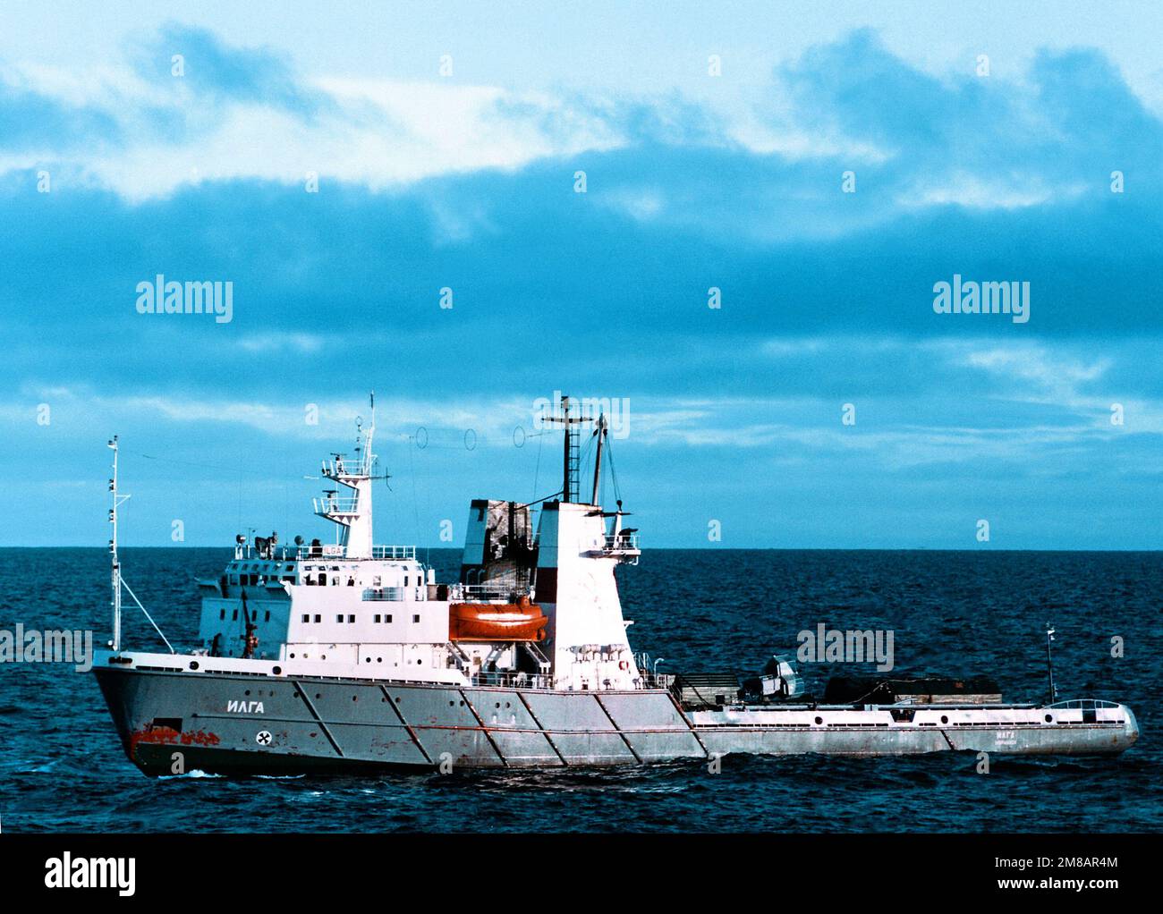 A port beam view of the Soviet Neftegaz class ocean tug ILGA underway ...