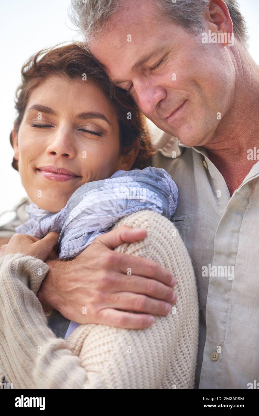 Life is all about love and laughter. a mature couple laughing and ...