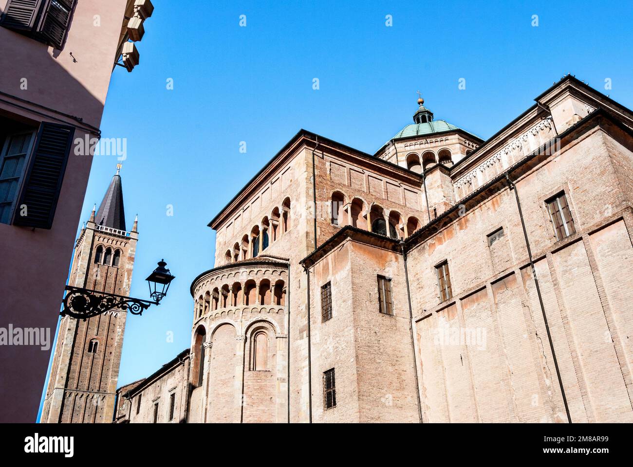 Bell tower and apse of the Romanesque Cathedral of Parma, dedicated to ...