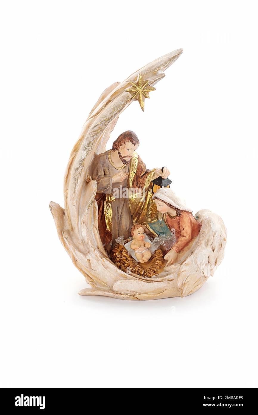 Set of Christmas nativity scene and angel figurines isolated on white ...