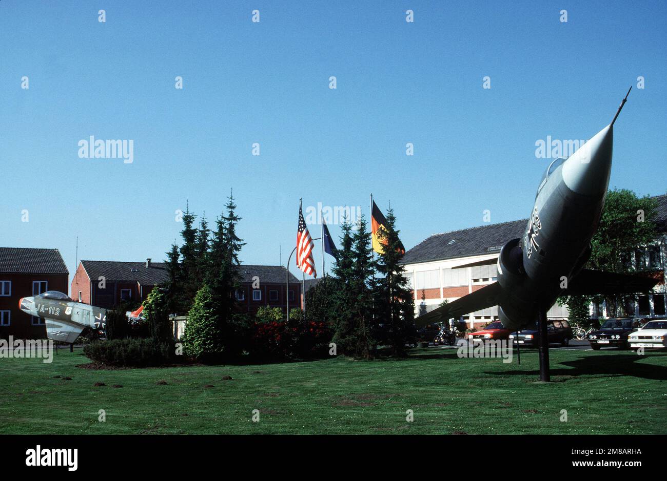 An F-86 Sabre aircraft, left, and an F-104 Starfighter aircraft flank ...