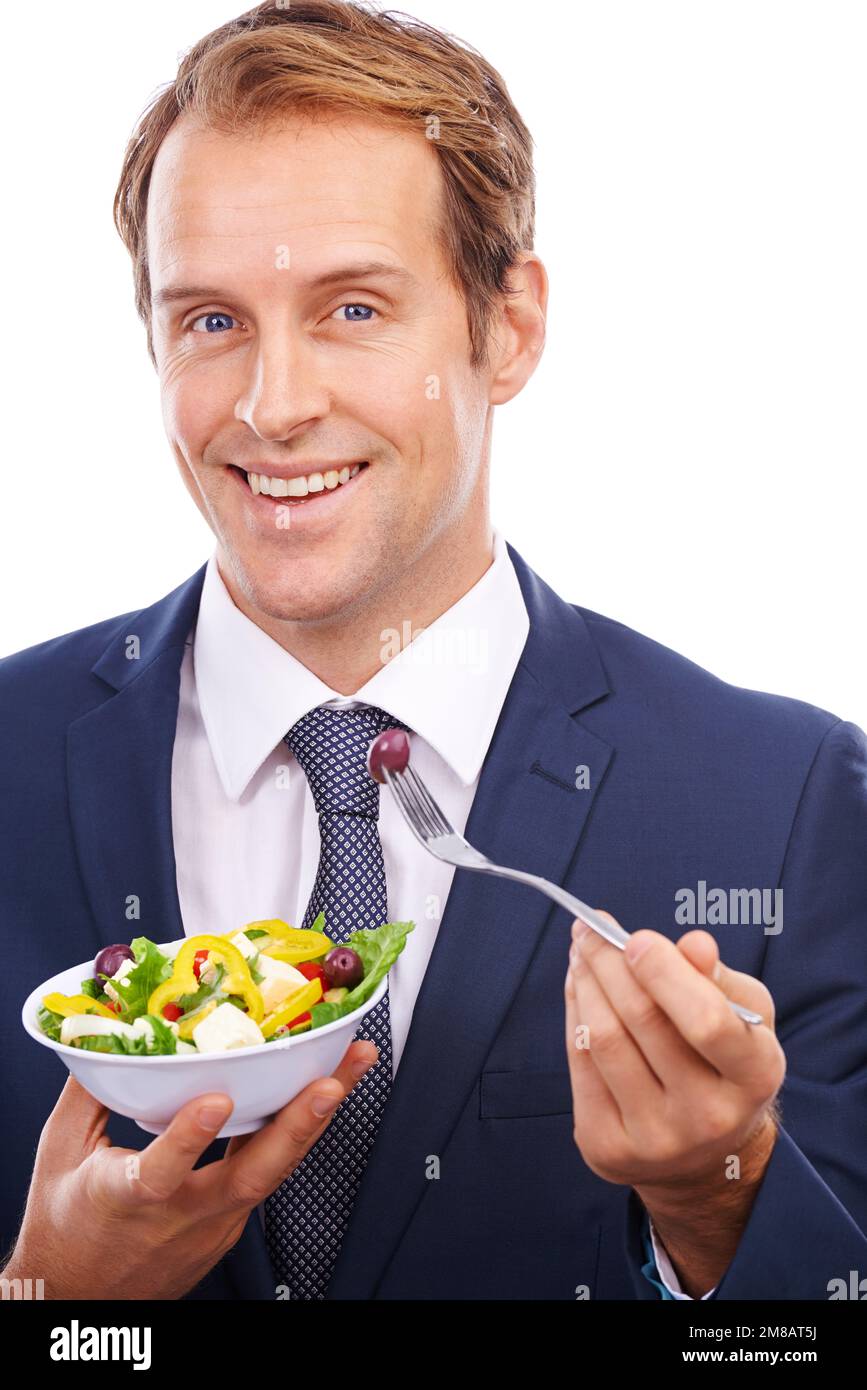 Business man, smile portrait and eating salad for healthy nutrition ...
