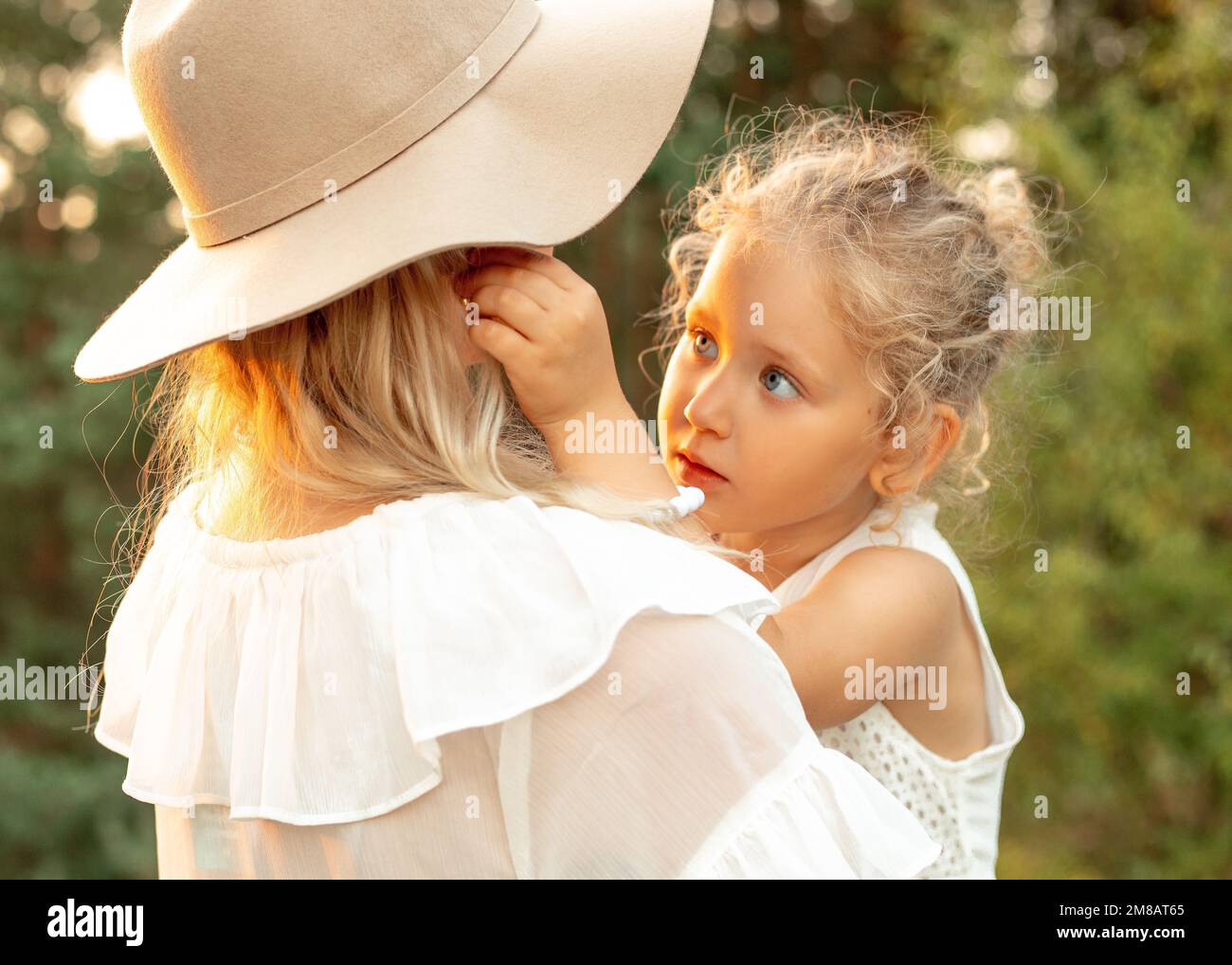 Girl sitting on hands hi-res stock photography and images - Alamy